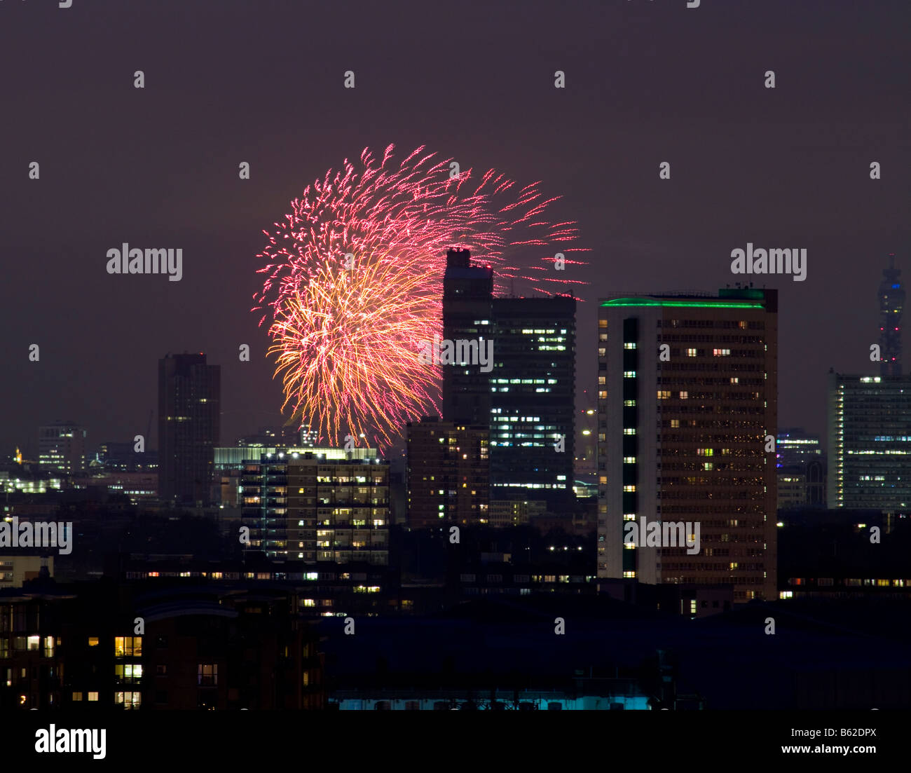 Firework display and the London skyline at night Stock Photo - Alamy