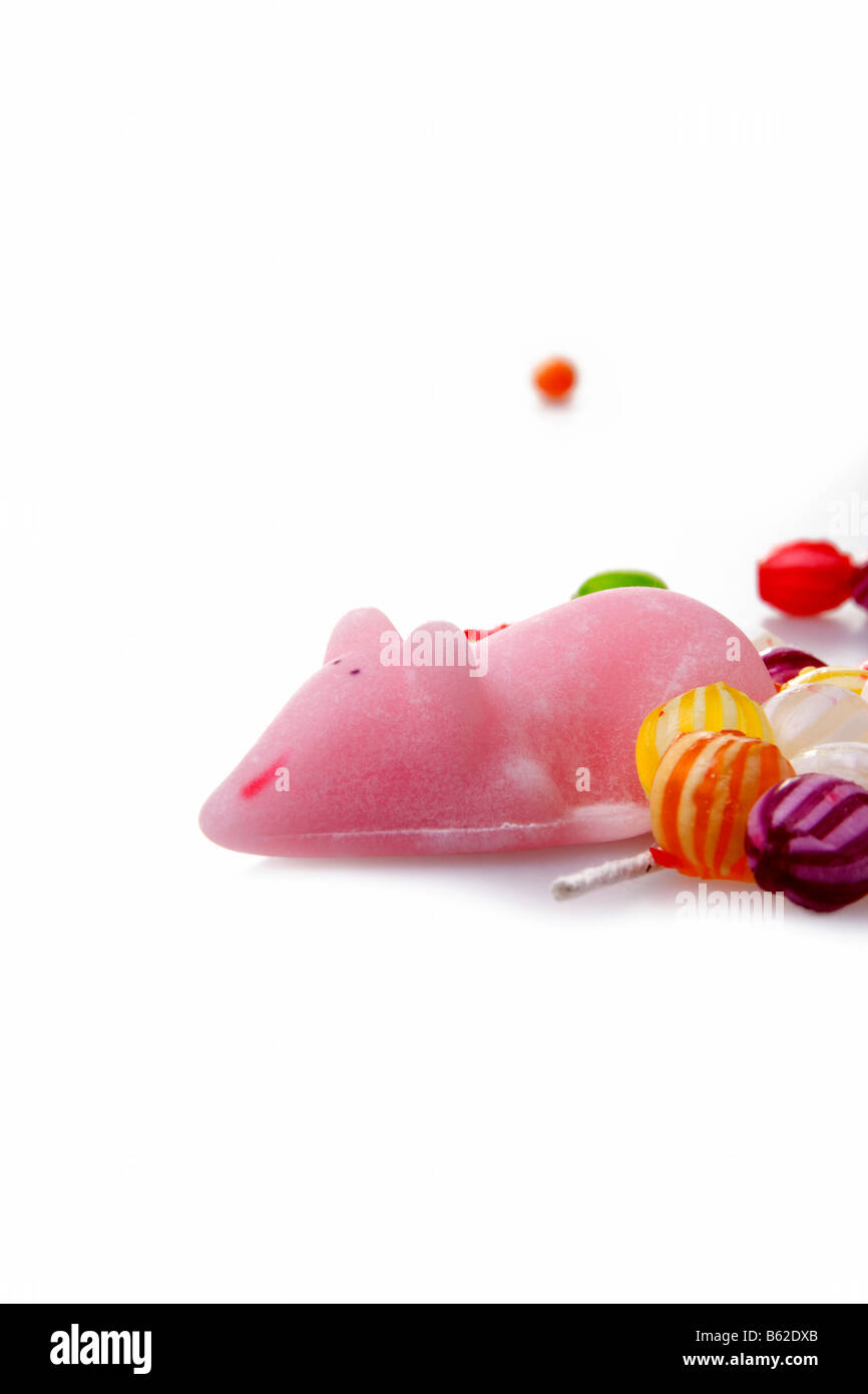 Candy sugar mice and colorful hard sweets on white background Stock ...