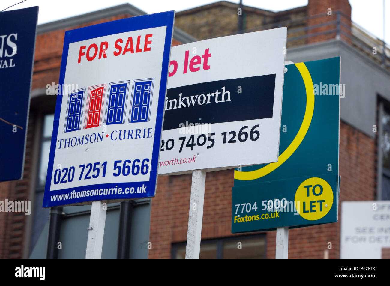 House for sale / let signs Stock Photo - Alamy