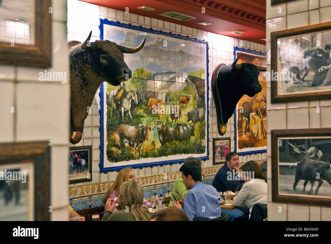 Tile mural of bulls and bulls heads in La Taurina restaurant Madrid ...