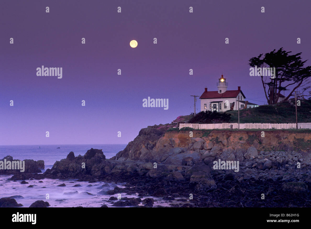 Dawn view full moon setting hi-res stock photography and images - Alamy