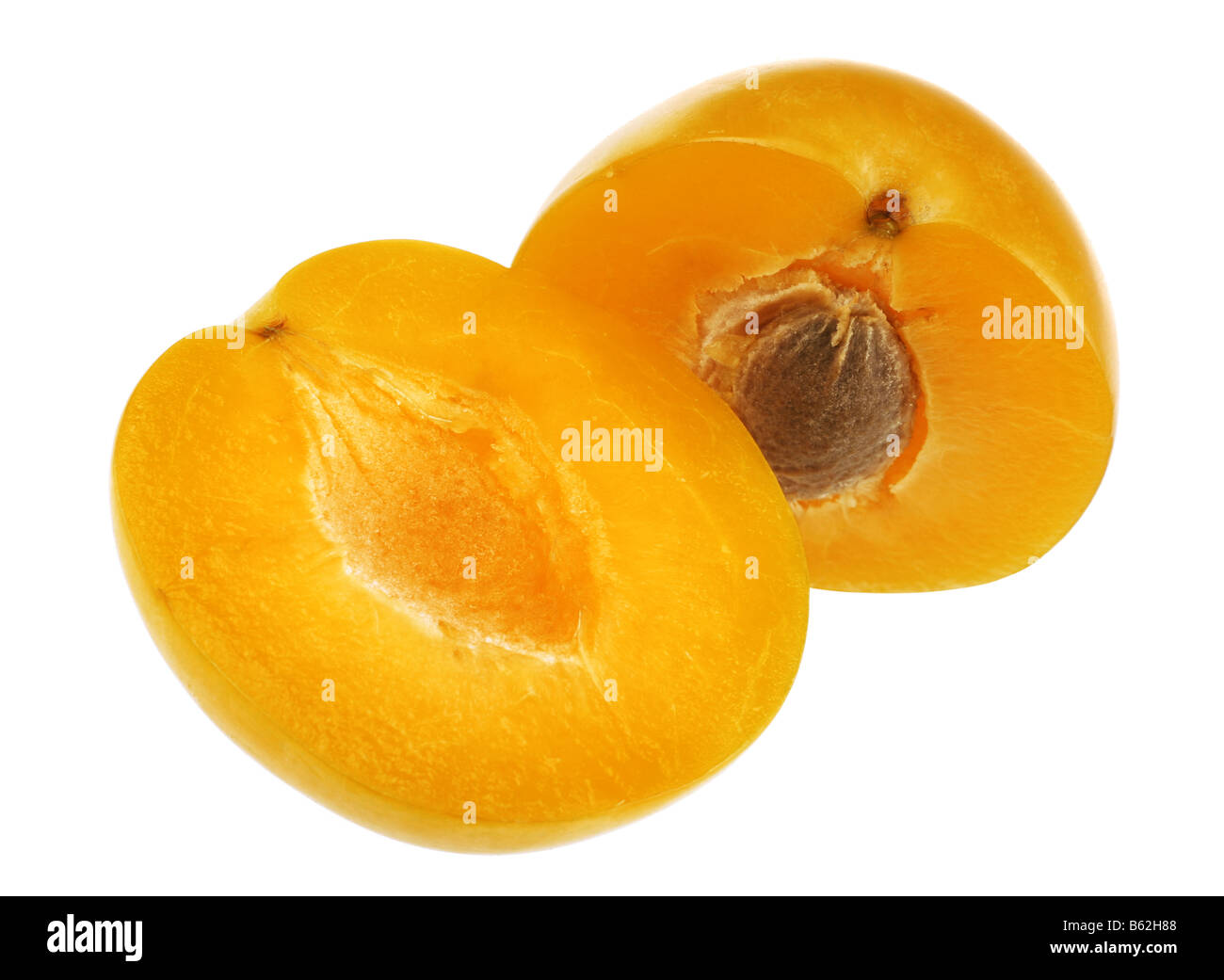Detail plum with slice on white background Stock Photo - Alamy