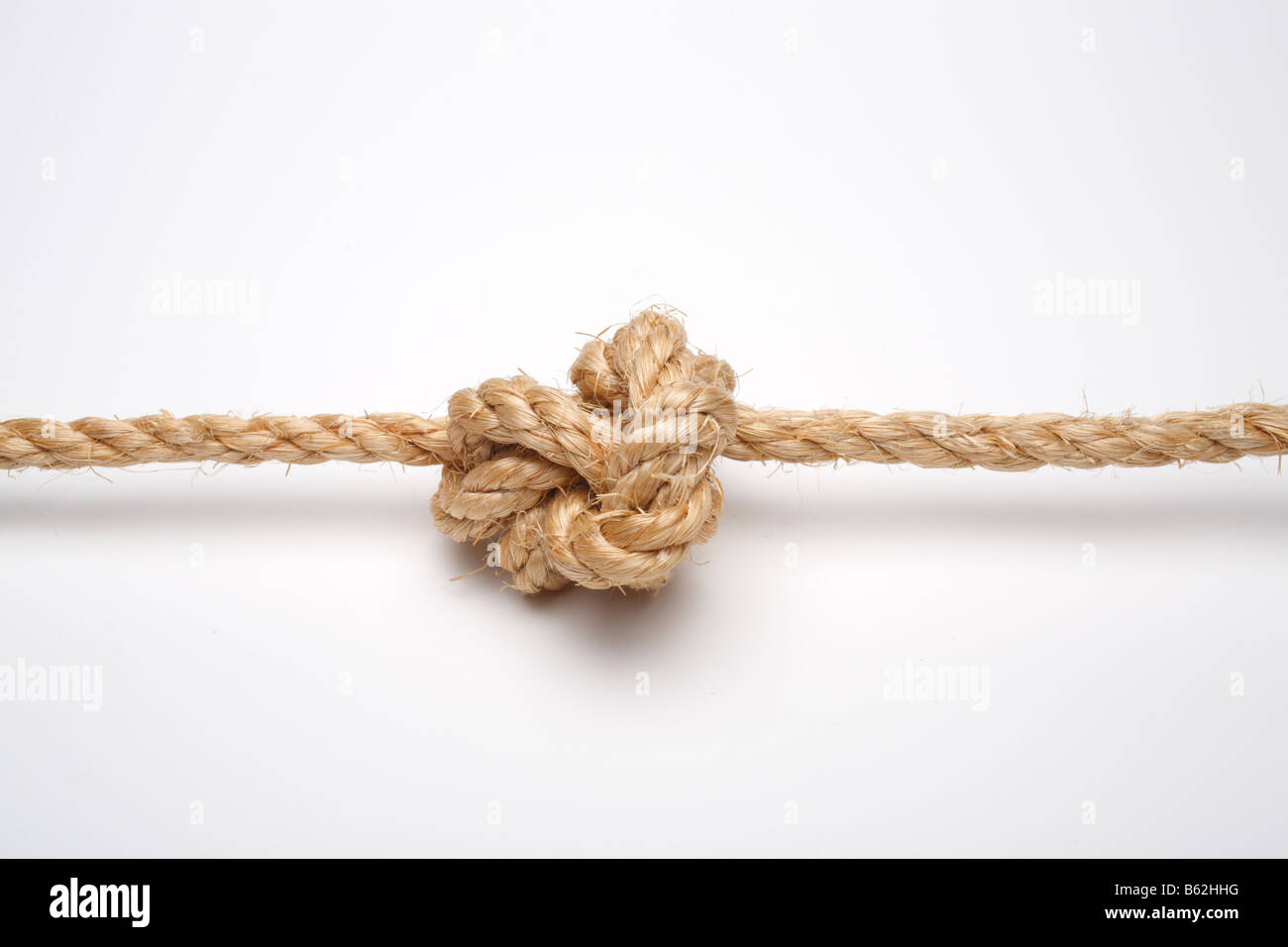 Large knot in rope Stock Photo - Alamy
