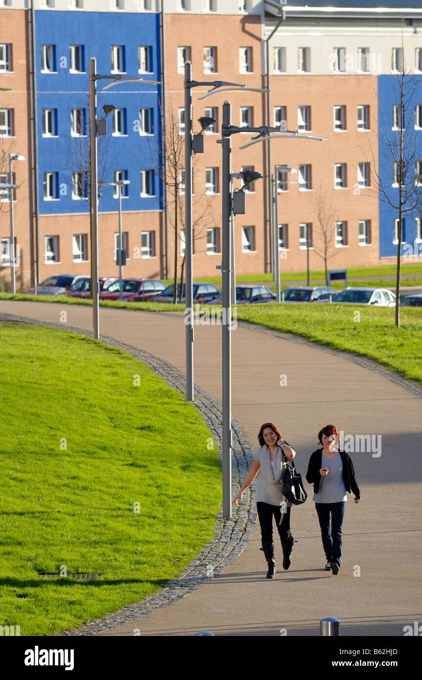 Students walking on a path with accommodation in the background Stock ...