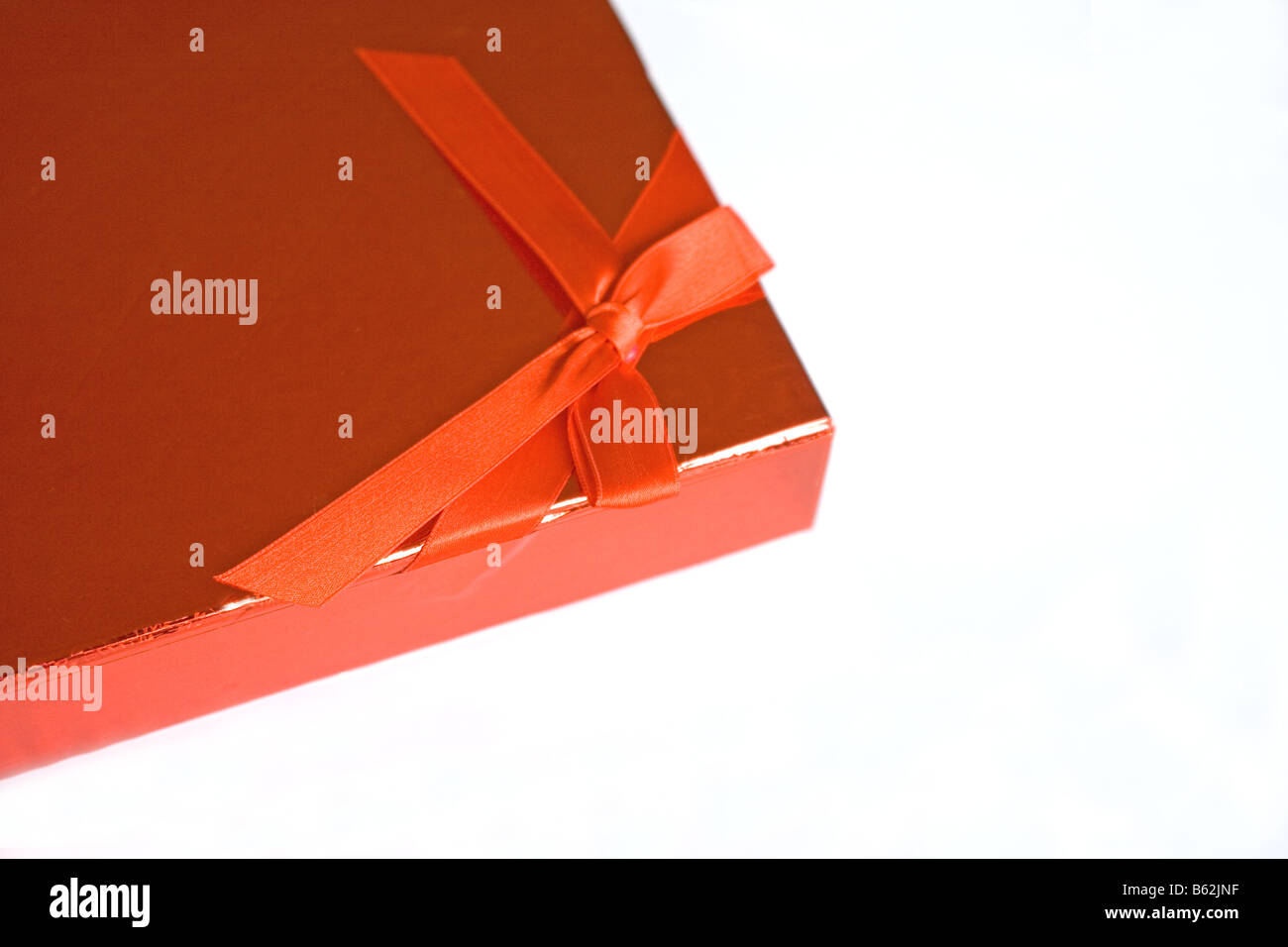 Red gift box Stock Photo - Alamy