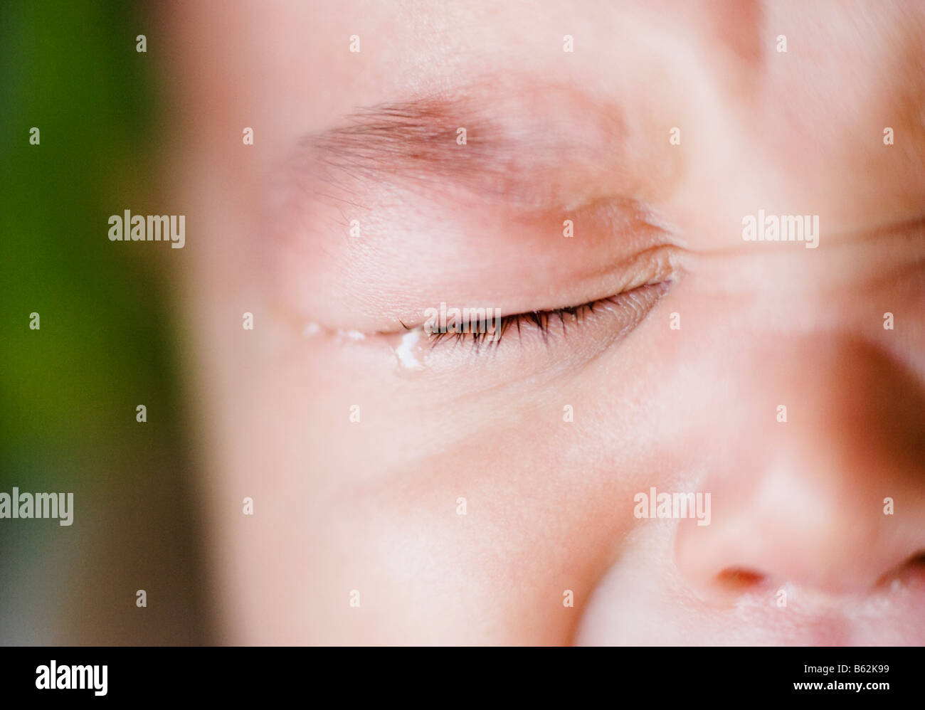 Close-up of a baby girl crying Stock Photo - Alamy