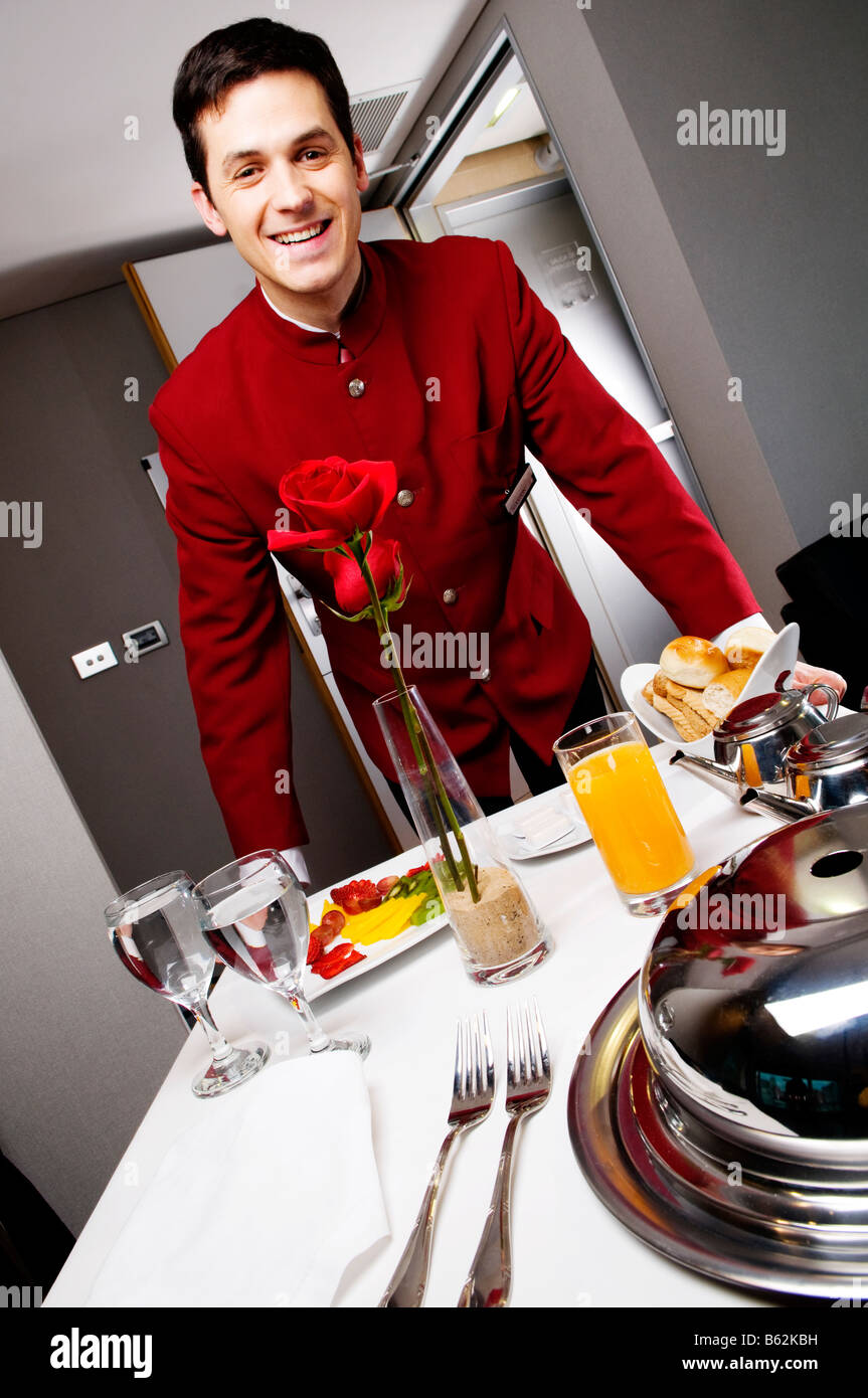 Waiter serving trolley hi-res stock photography and images - Alamy