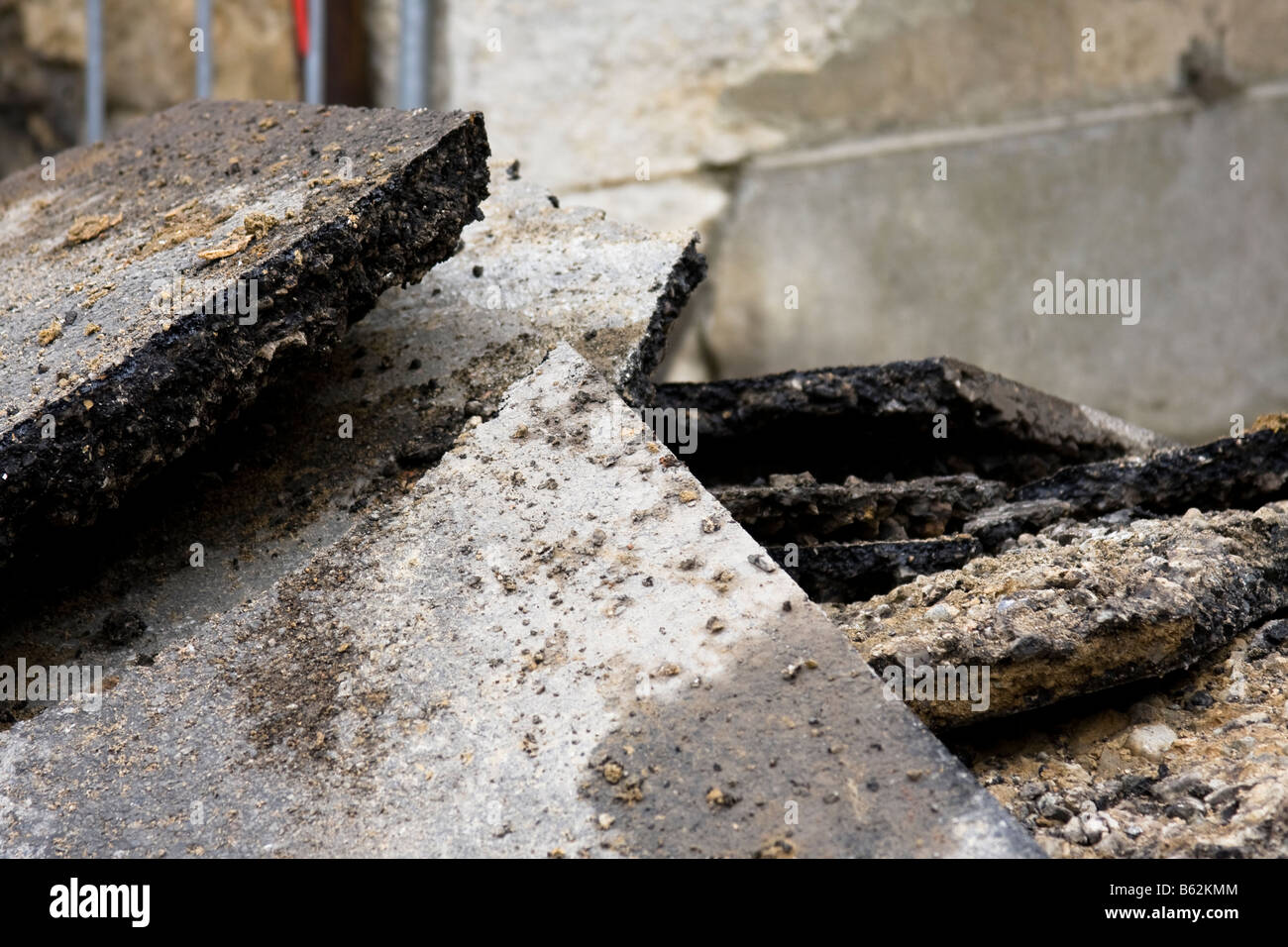 Broken tarmac slabs from road repair Stock Photo - Alamy