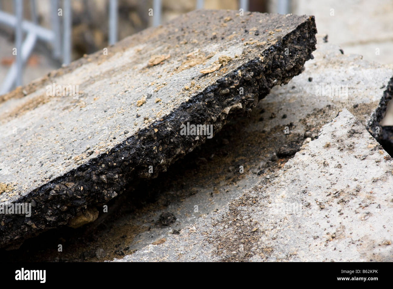 Broken tarmac slabs from road repair Stock Photo - Alamy