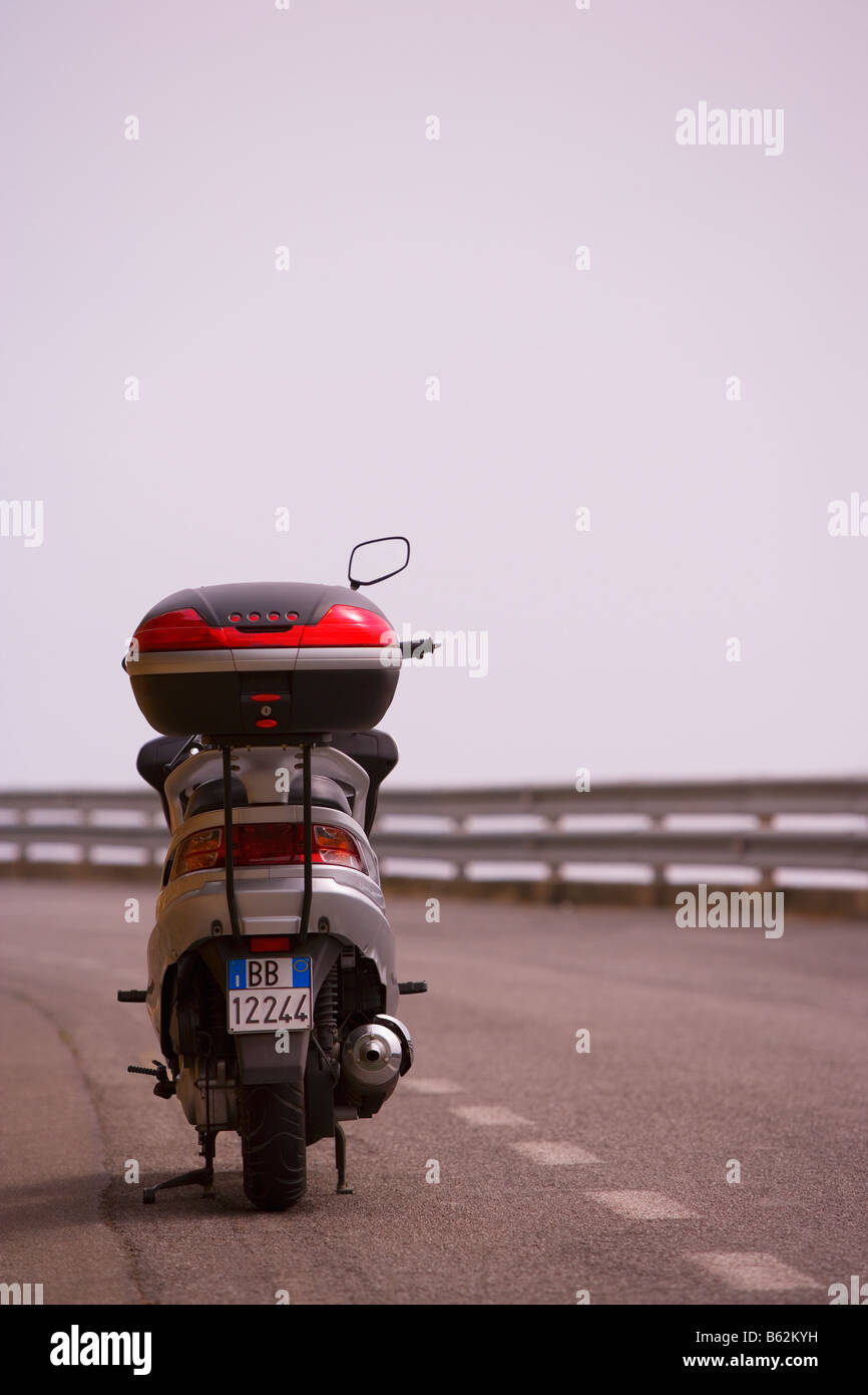 Moped parked on a road, Via Aurelia, Italian Riviera, Liguria, Italy ...