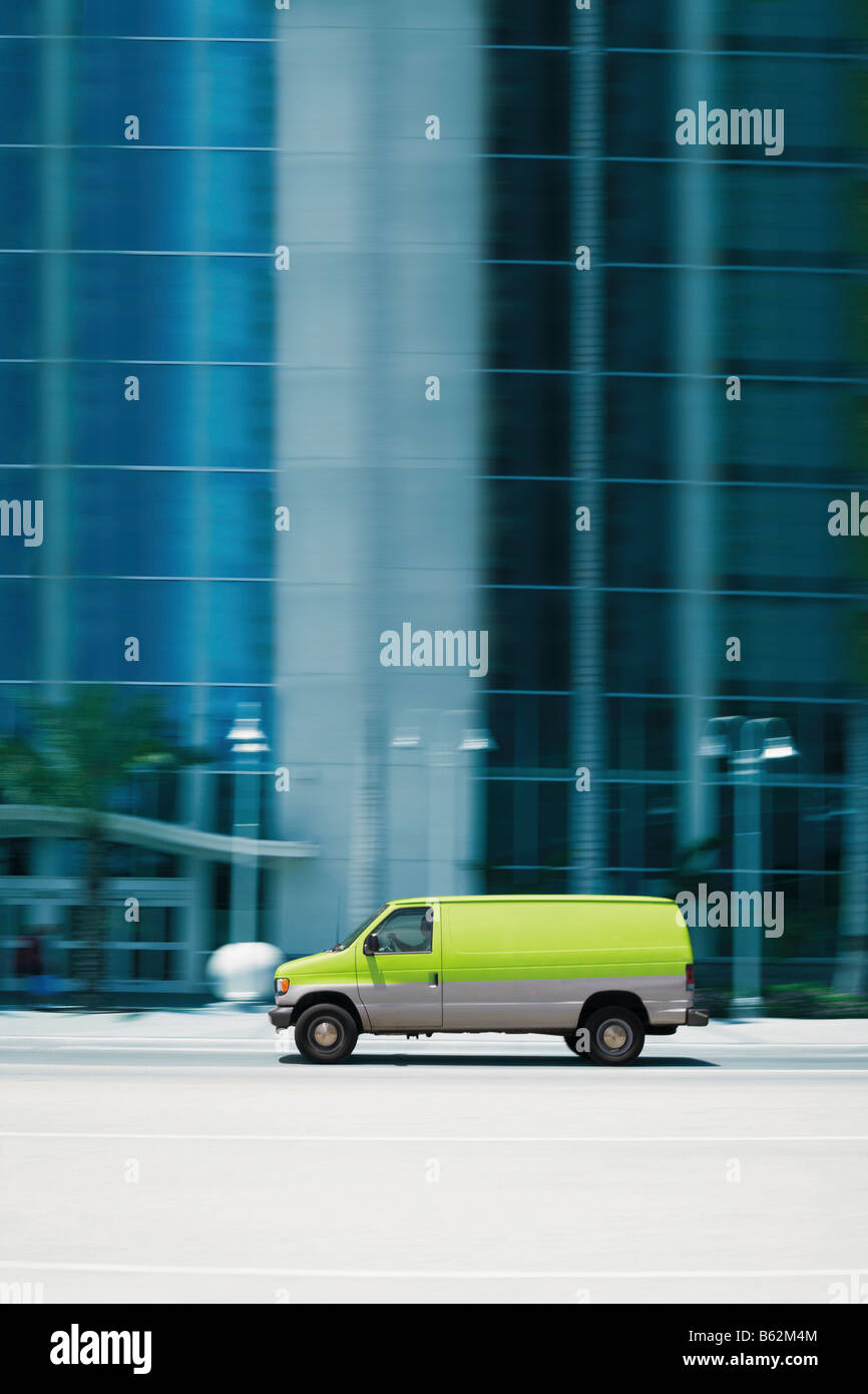 Delivery van moving on the road Stock Photo - Alamy