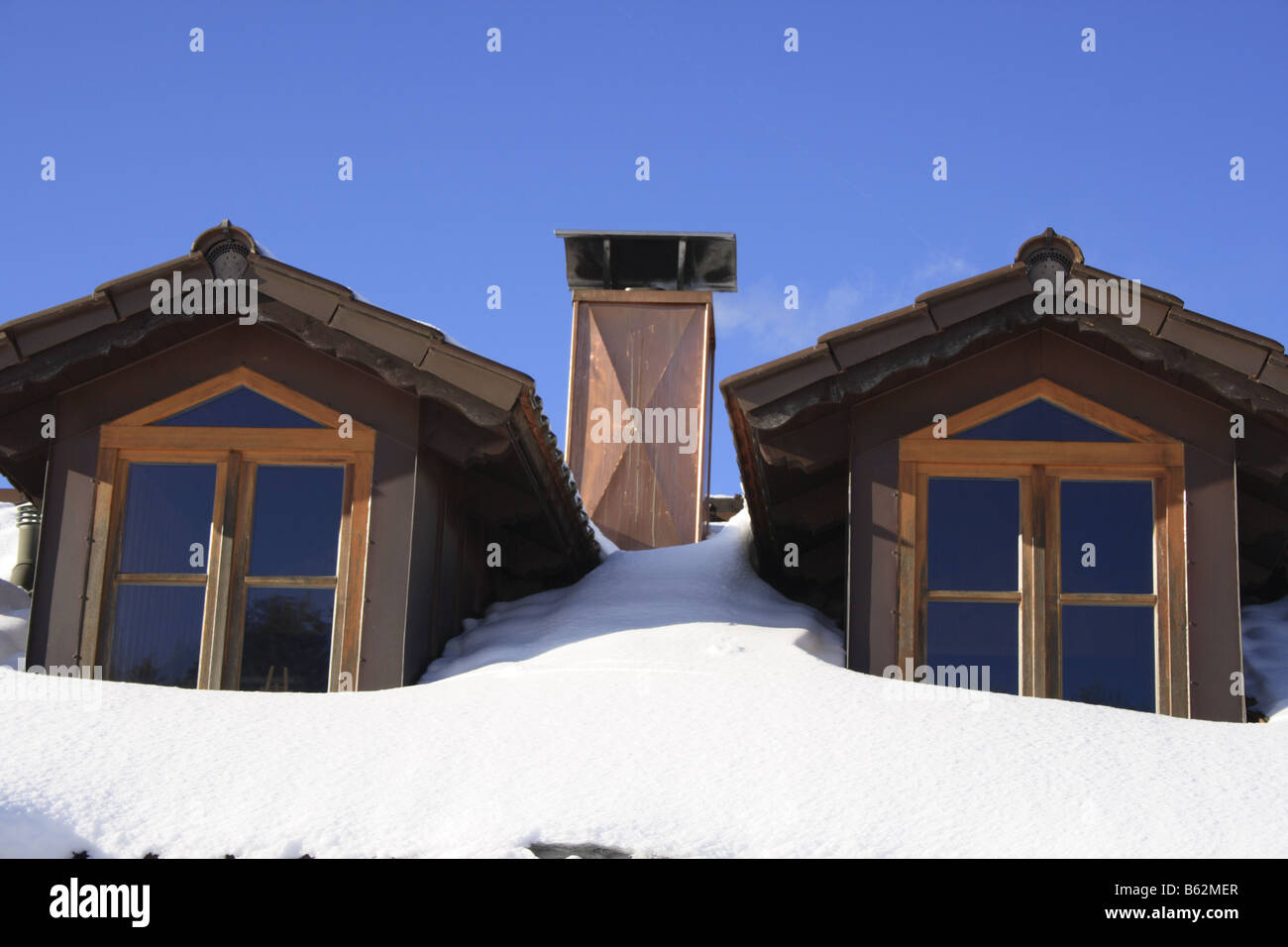 two attic windows on roof of a house in winter, Bavarian Forest Bavaria ...