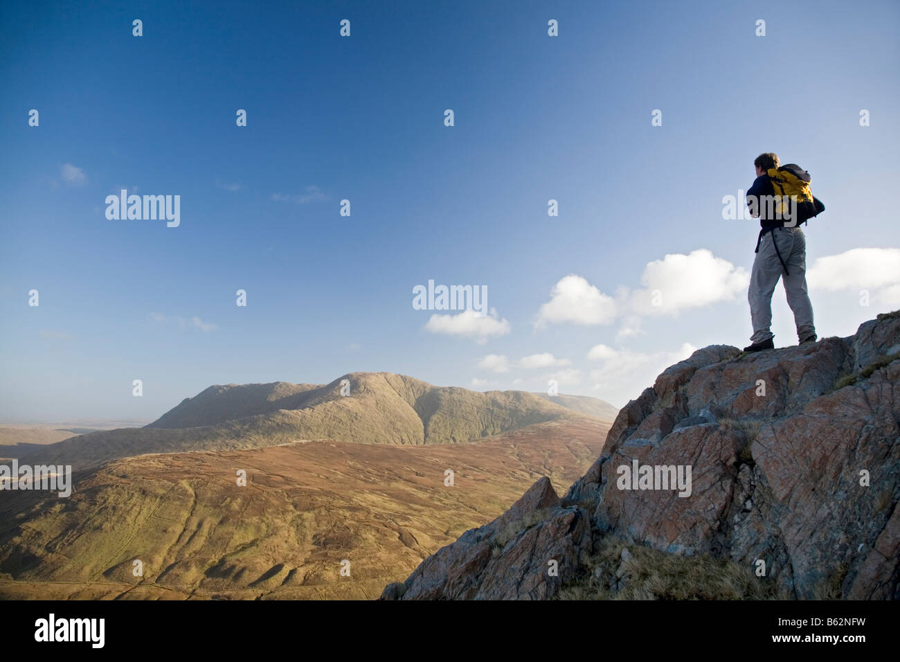 Hiker looking at mountain view hi-res stock photography and images - Alamy