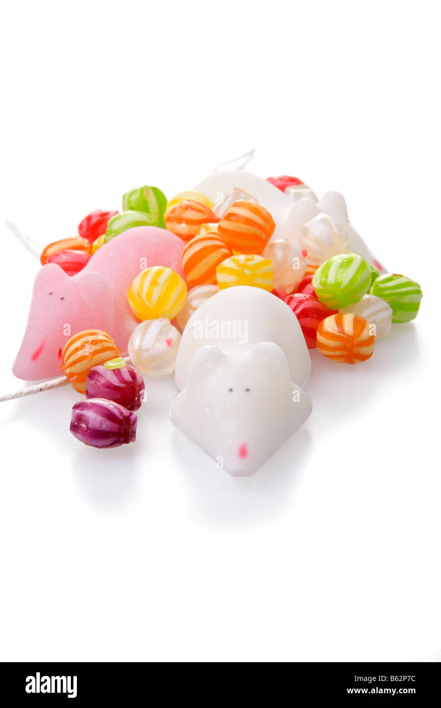 Candy sugar mice and colorful hard sweets on white background Stock ...