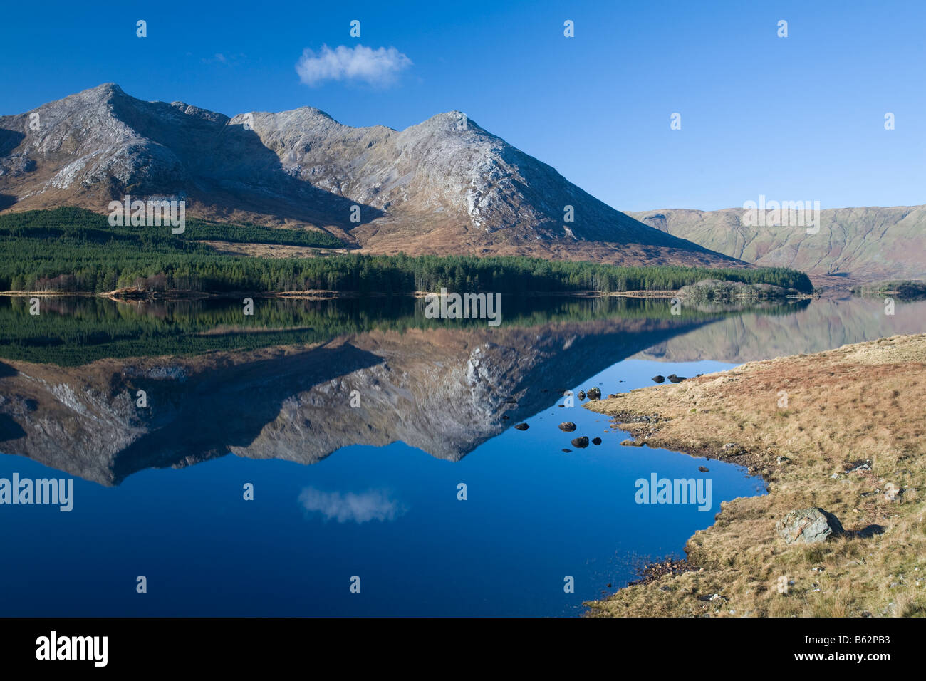 Reflection of the Twelve Bens Mountains in Lough Inagh, Connemara ...