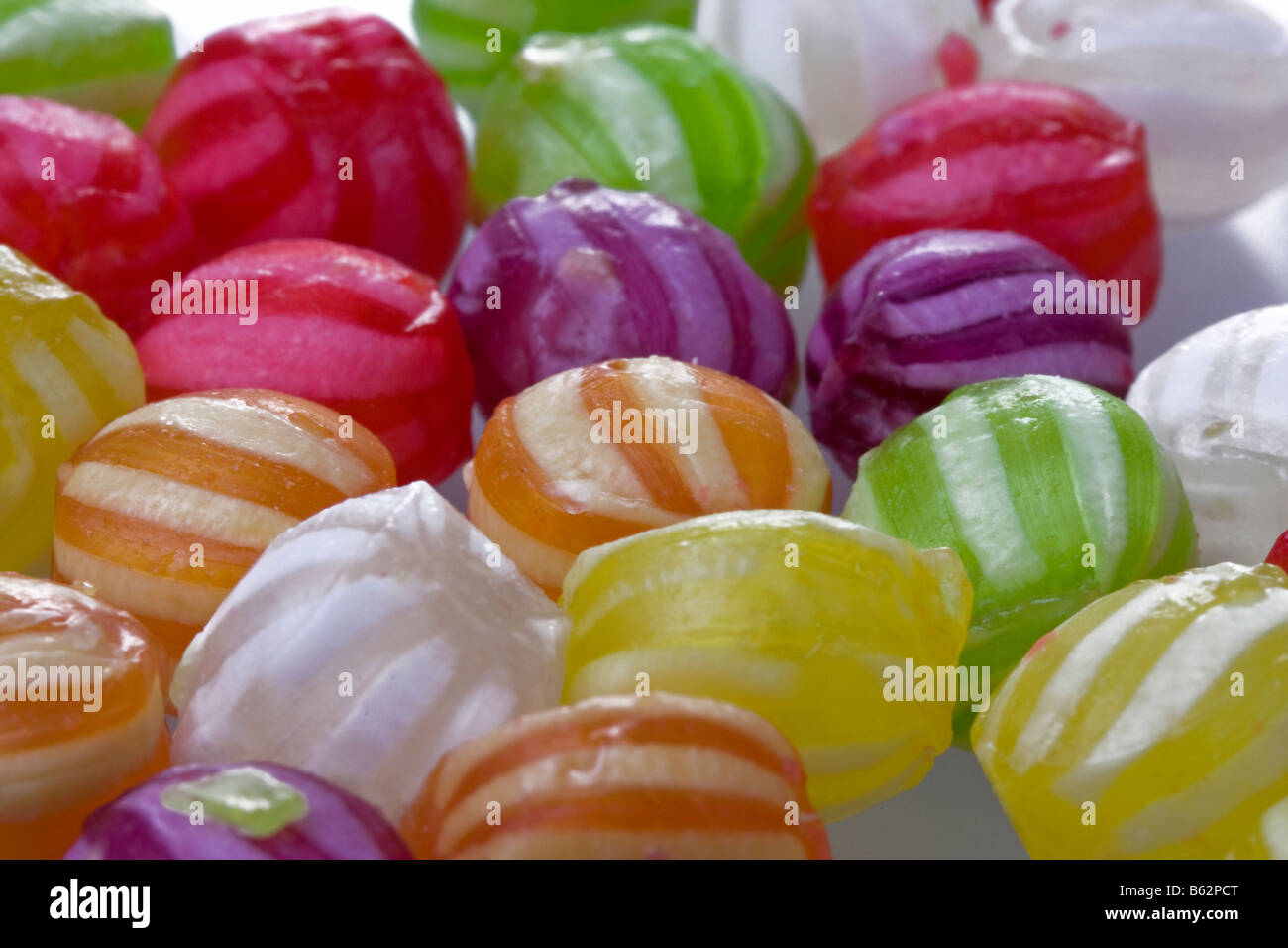 colorful hard sweets on white backround Stock Photo - Alamy