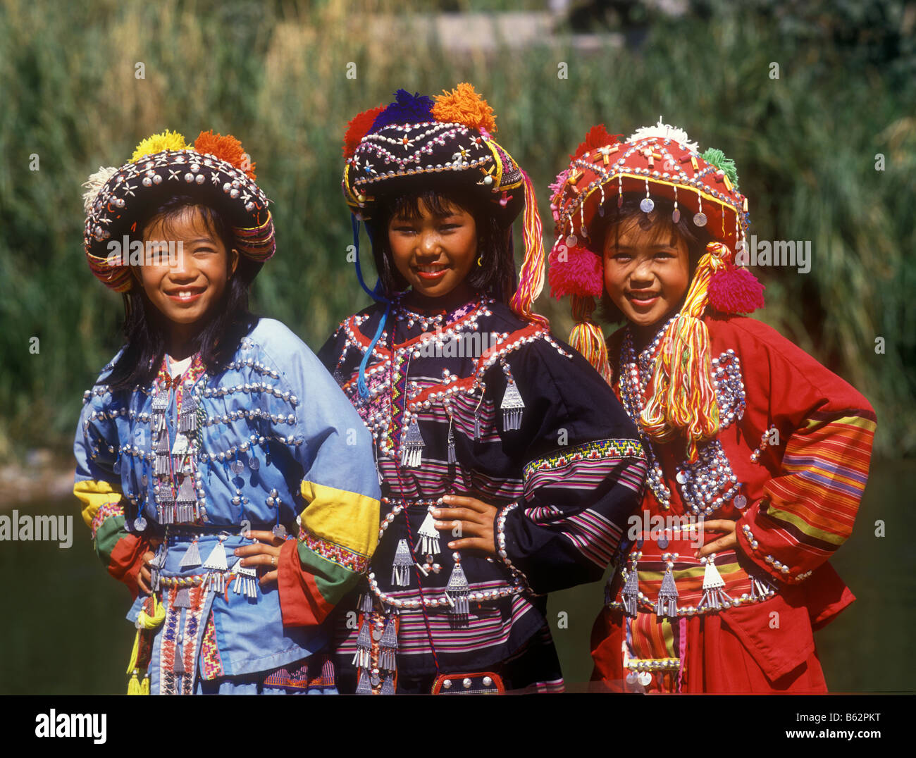 Young girls of the Meo Hill Tribe wearing the traditional dress of the ...