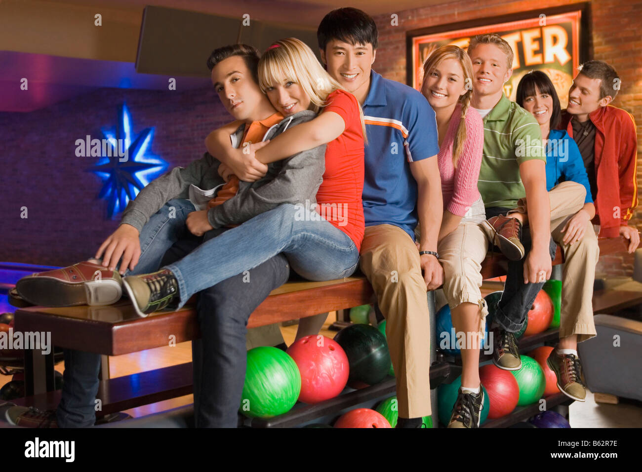 Portrait of a group of friends smiling Stock Photo - Alamy