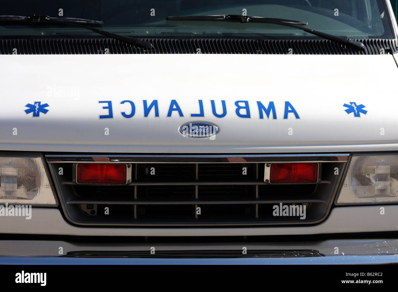 Front hood of an Emergency Vehicle Ambulance mirror image Stock Photo ...