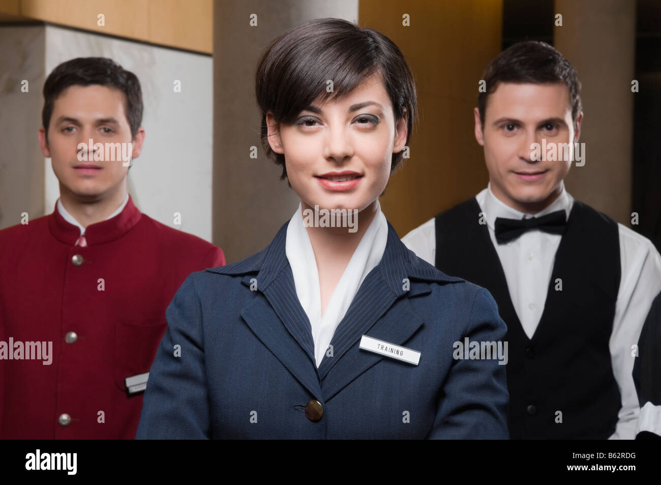 Portrait male receptionist hotel front hi-res stock photography and ...