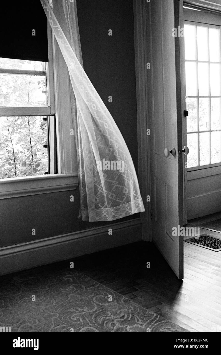 Open window blowing curtain Black and White Stock Photos & Images - Alamy