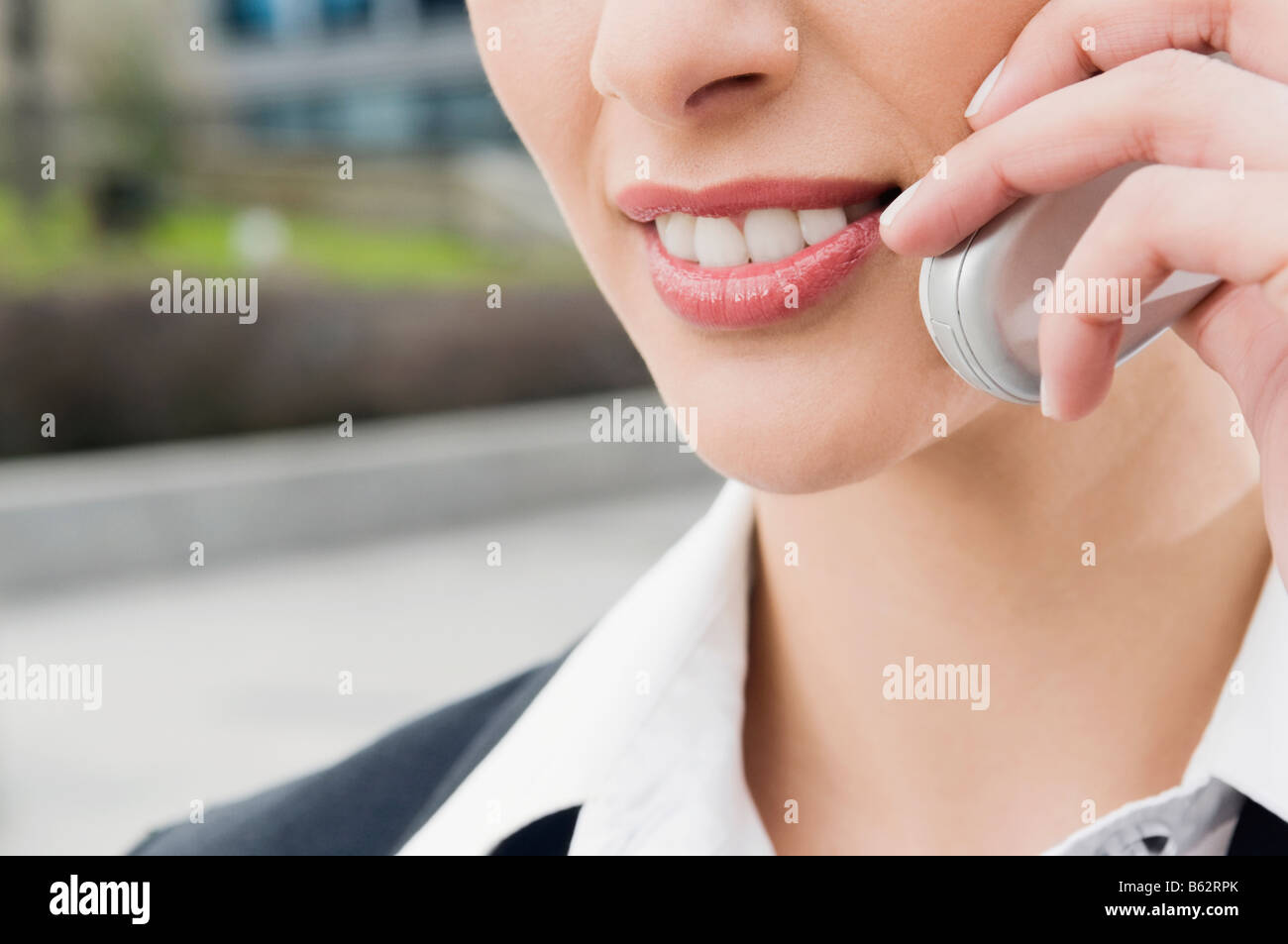 Smiling employee talking on hi-res stock photography and images - Alamy