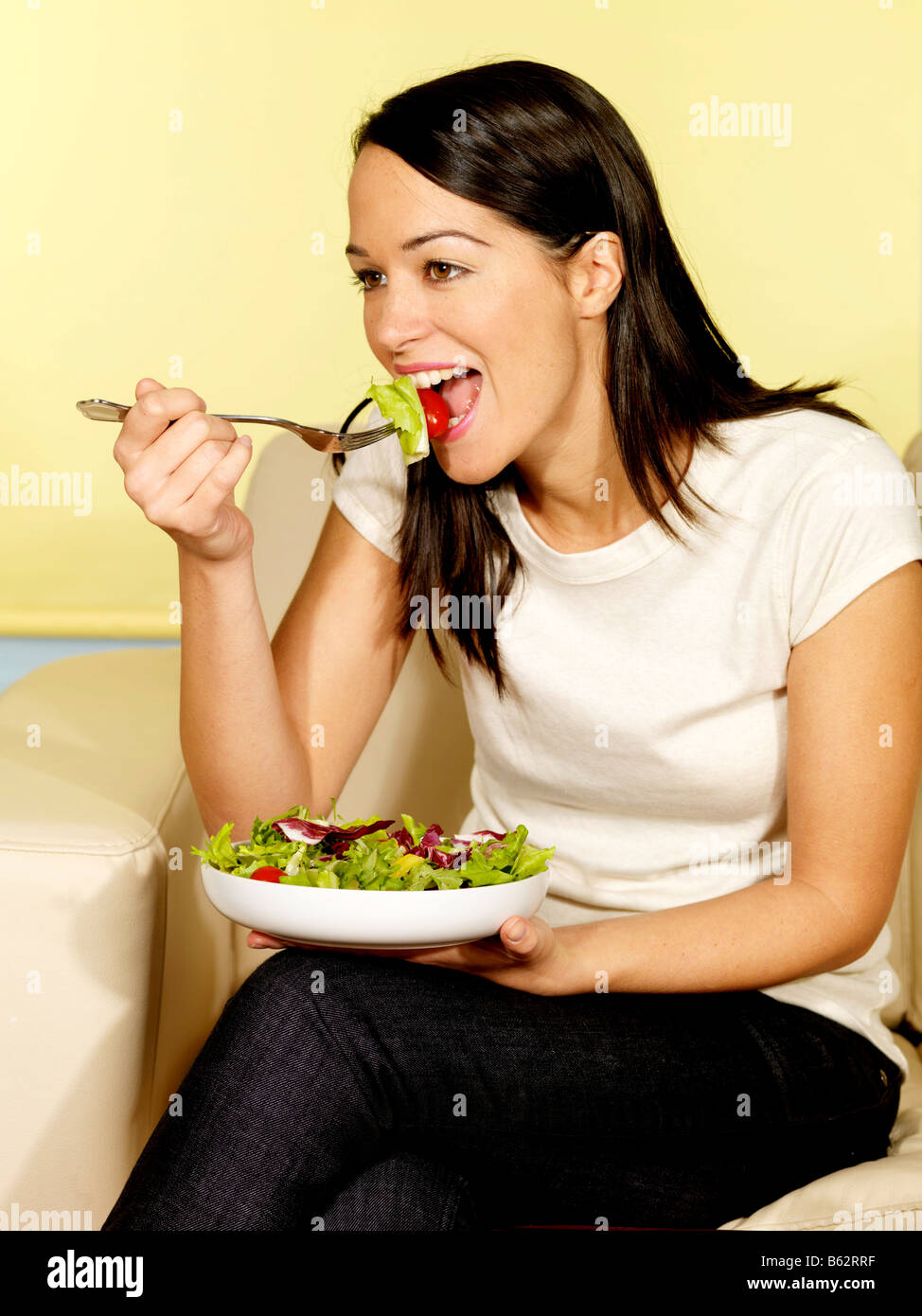 Young Woman Eating Salad Model Released Stock Photo - Alamy