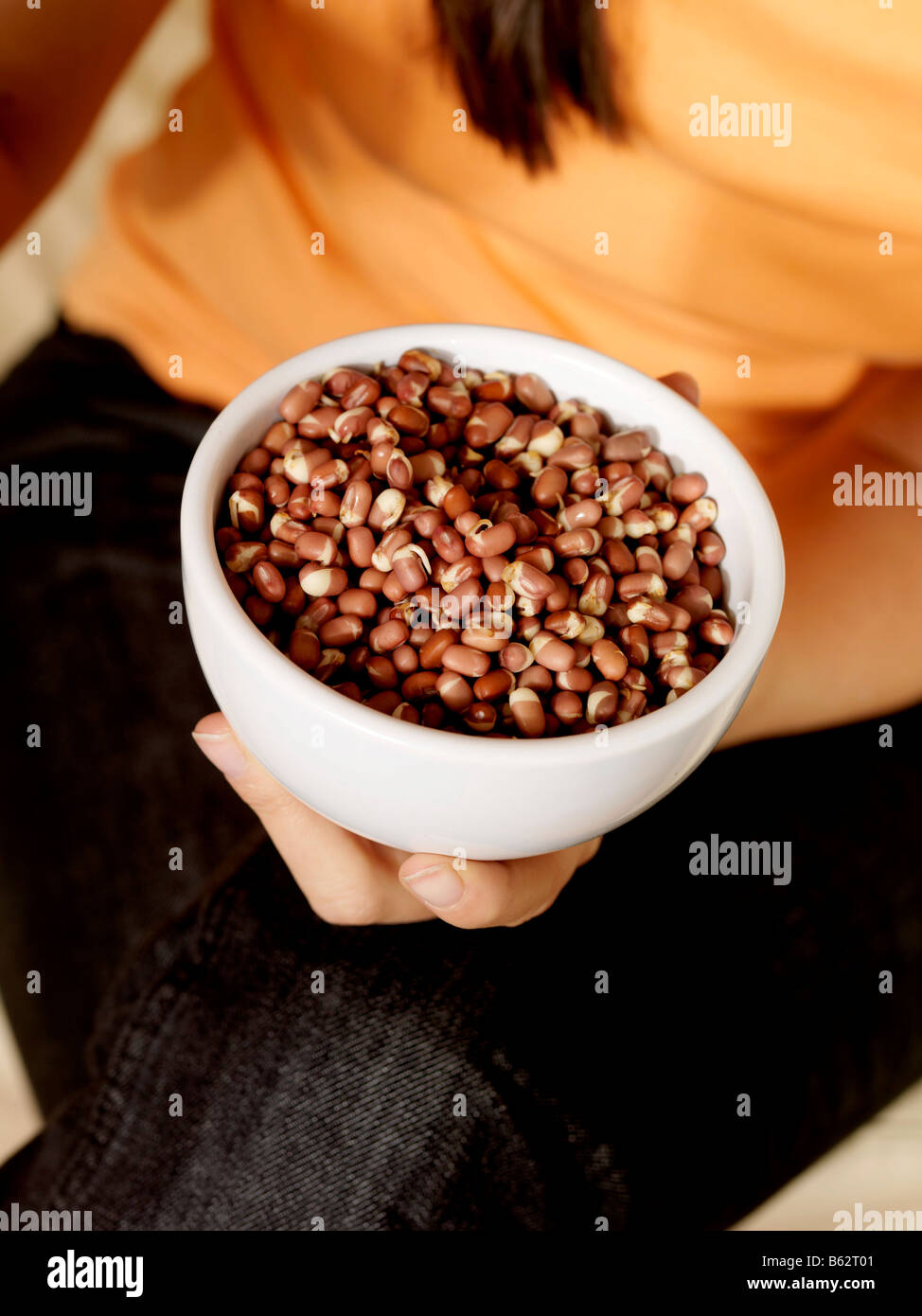 Young Woman Eating Aduki Beans Model Released Stock Photo - Alamy