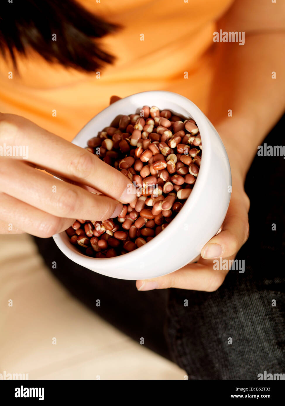 Young Woman Eating Aduki Beans Model Released Stock Photo - Alamy