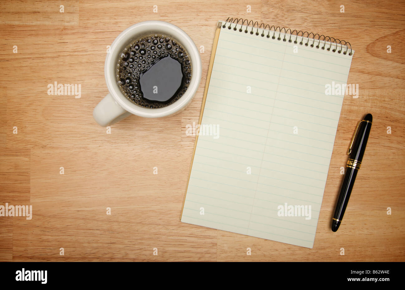 Blank Pad of Paper ready for your own text Pen Coffee Stock Photo - Alamy