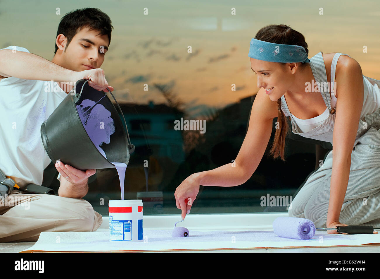 Woman mixing colors sitting hi-res stock photography and images - Alamy