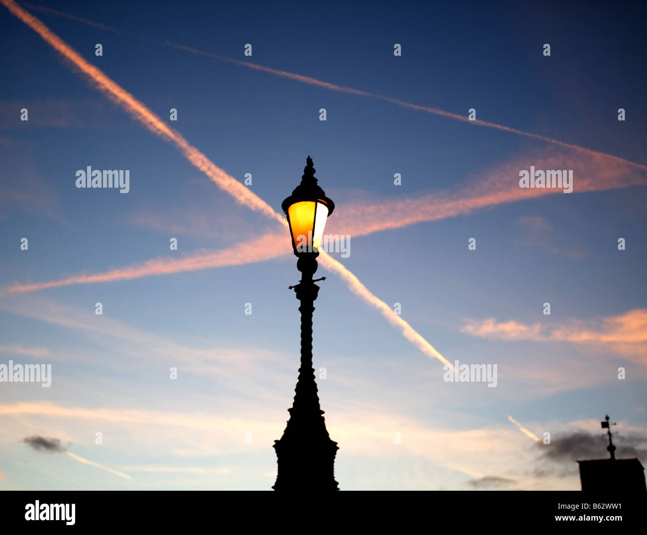 A lamp post against the sky at sunset, Tower Hill, London Stock Photo ...