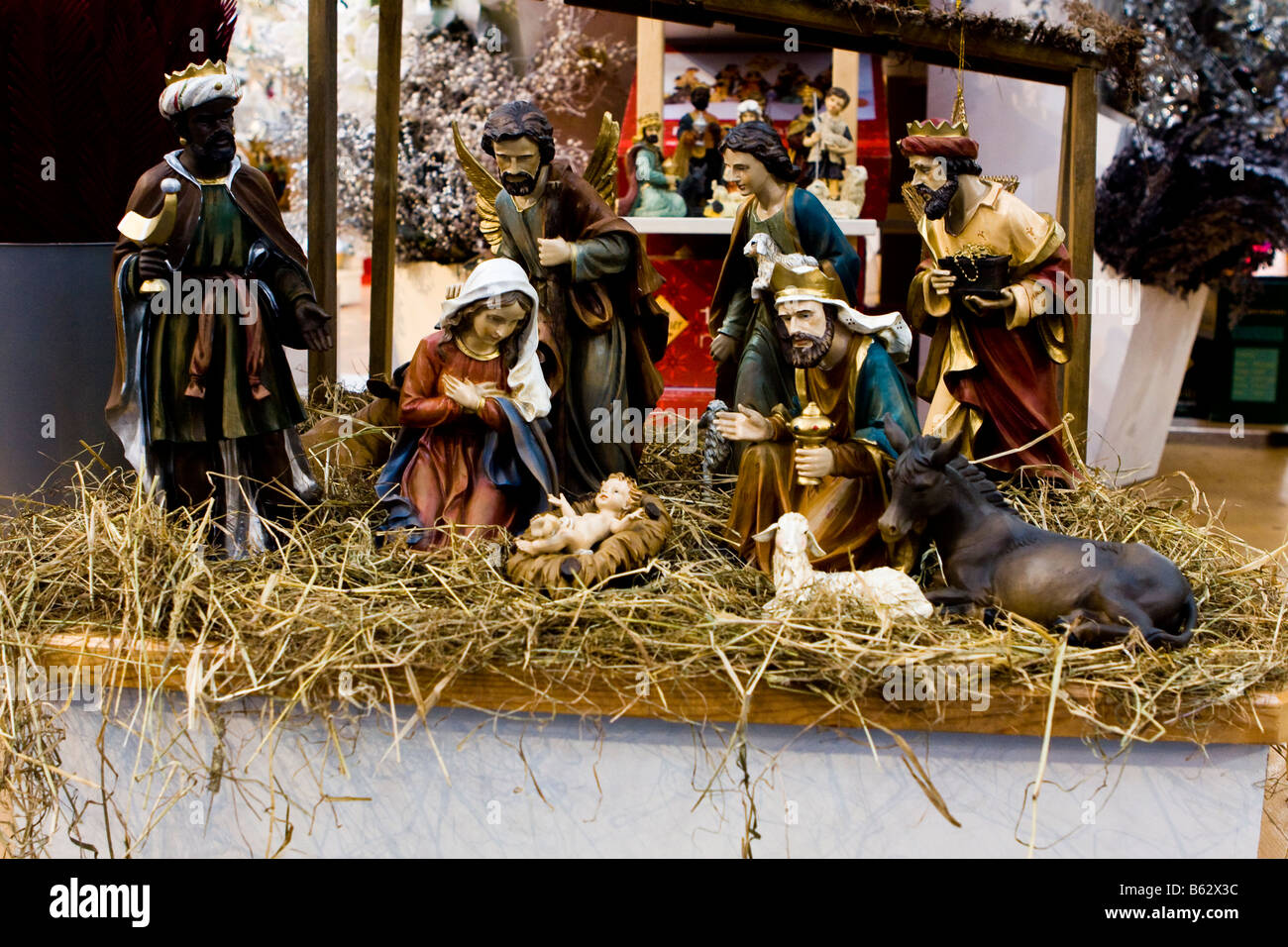 Nativity scene with another in background Stock Photo - Alamy