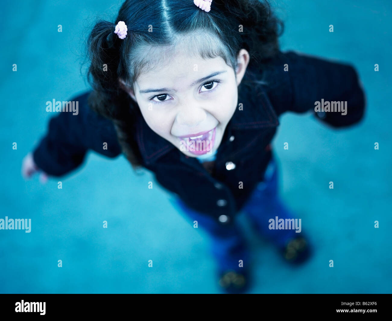 Portrait of a girl shouting Stock Photo - Alamy
