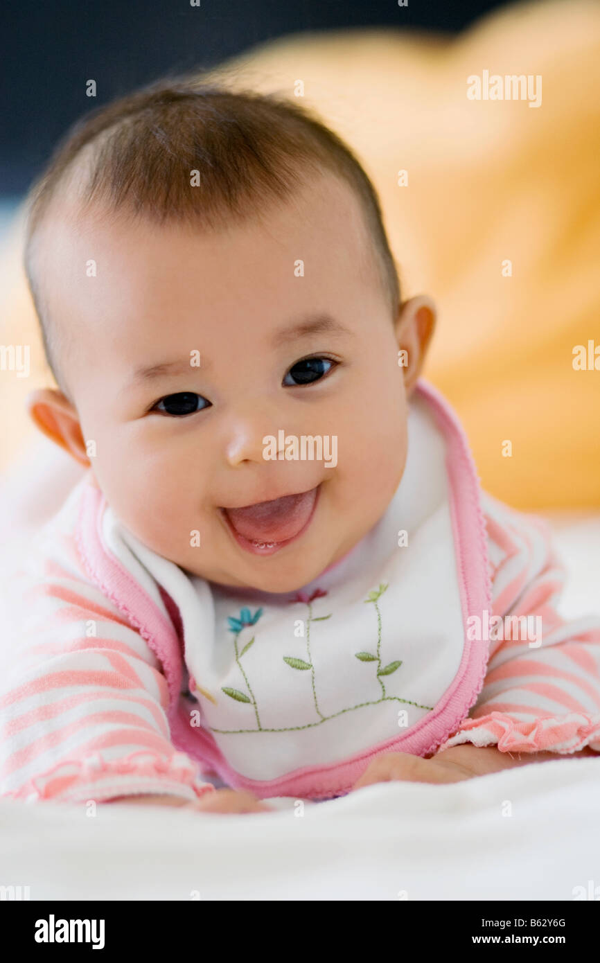 Portrait of a baby girl smiling Stock Photo - Alamy