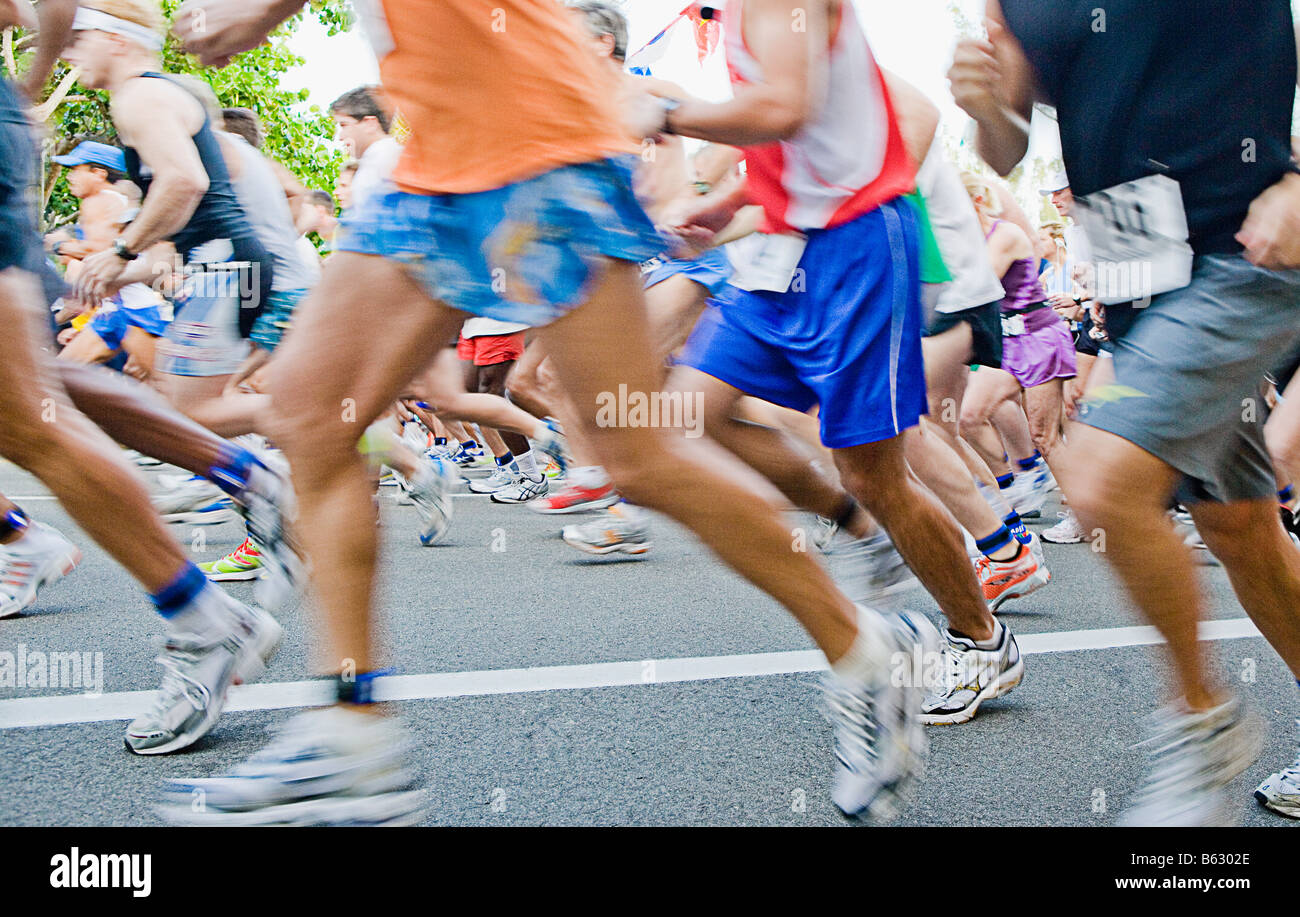 Group of people running a marathon Stock Photo - Alamy