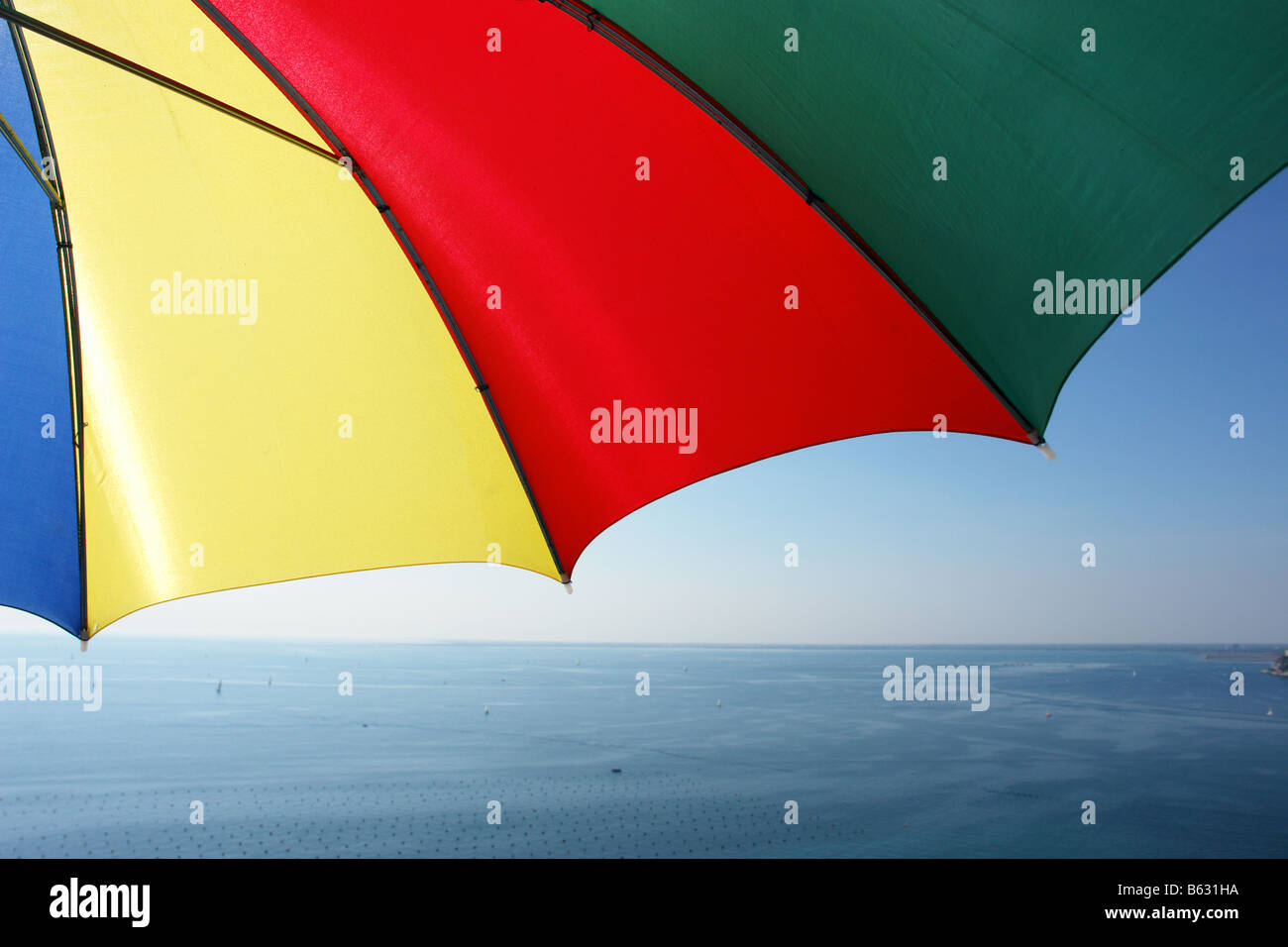 colorful parasol at the ocean Stock Photo - Alamy