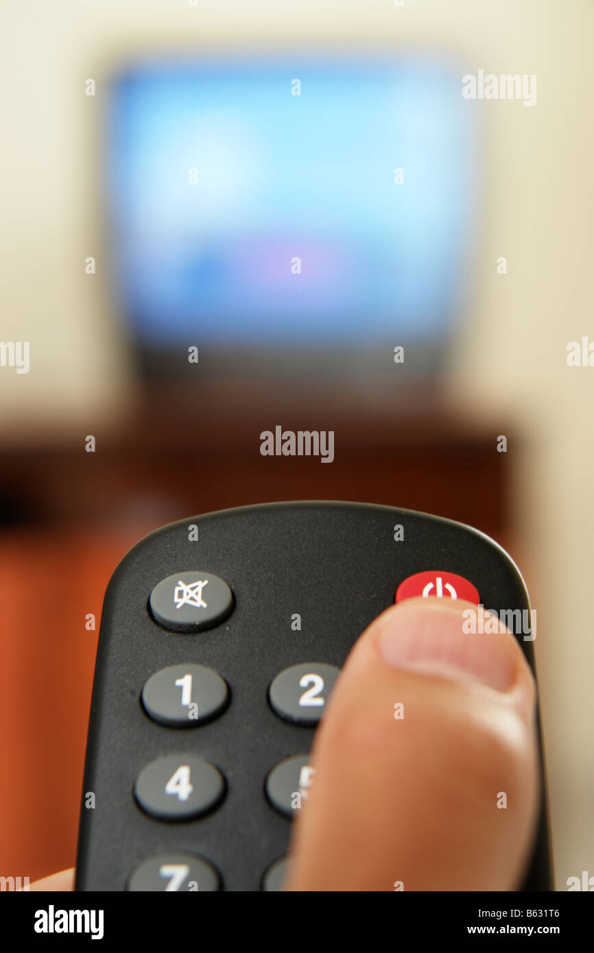 Television screen with tv remote control in foreground Stock Photo - Alamy