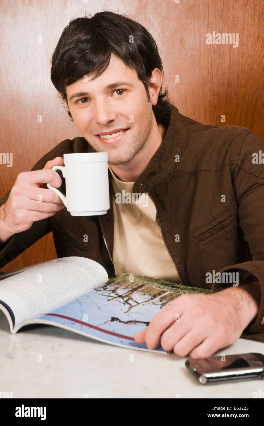 Magazine in a coffee shop hi-res stock photography and images - Alamy