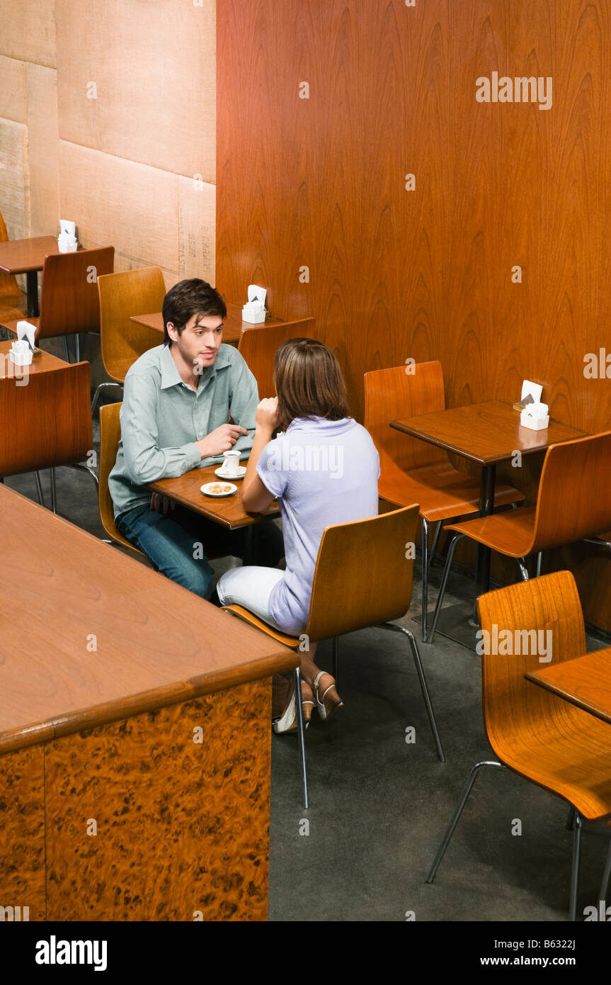 High angle view of a young couple having coffee in a cafe Stock Photo ...