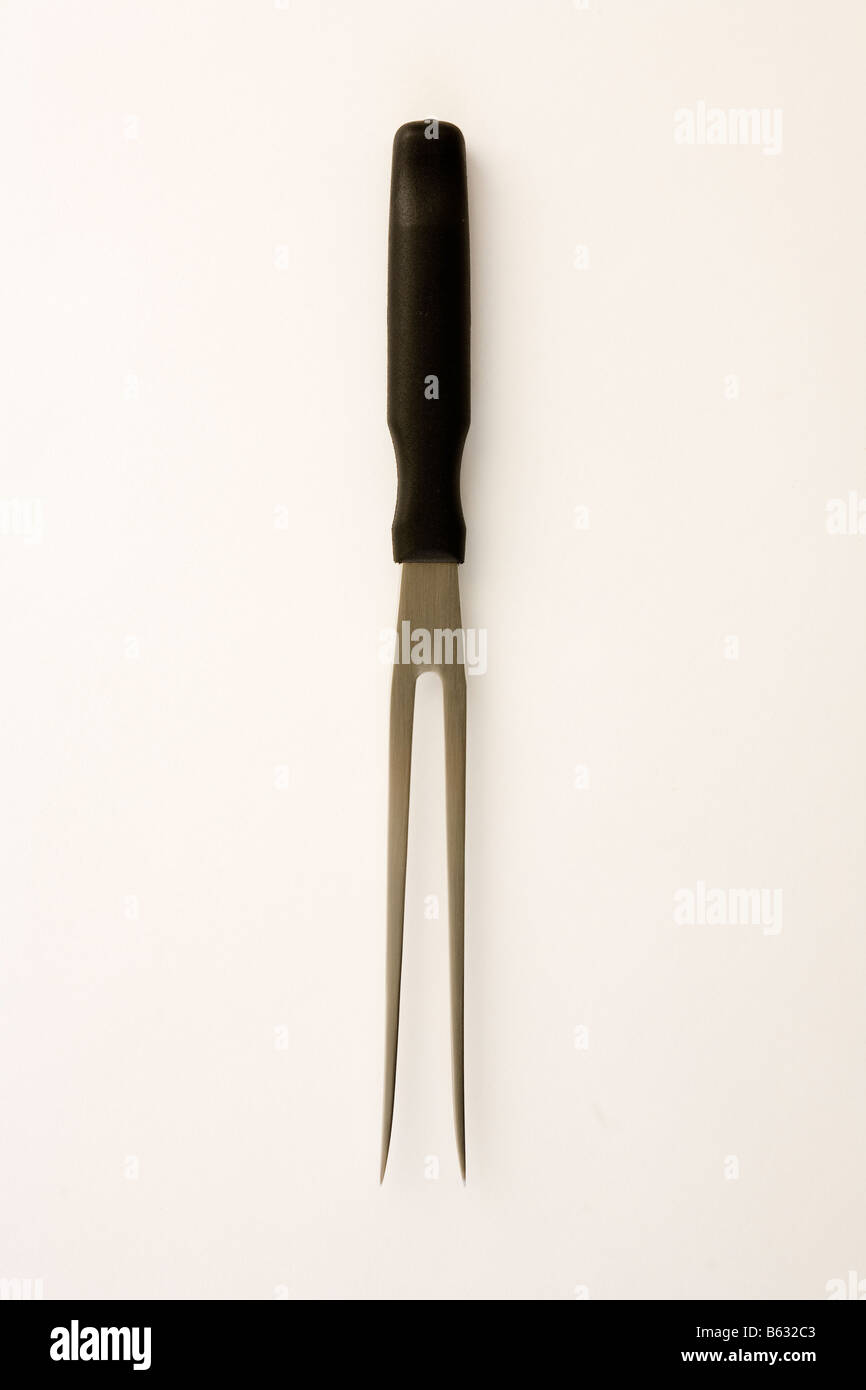 long prong butchers fork Stock Photo - Alamy