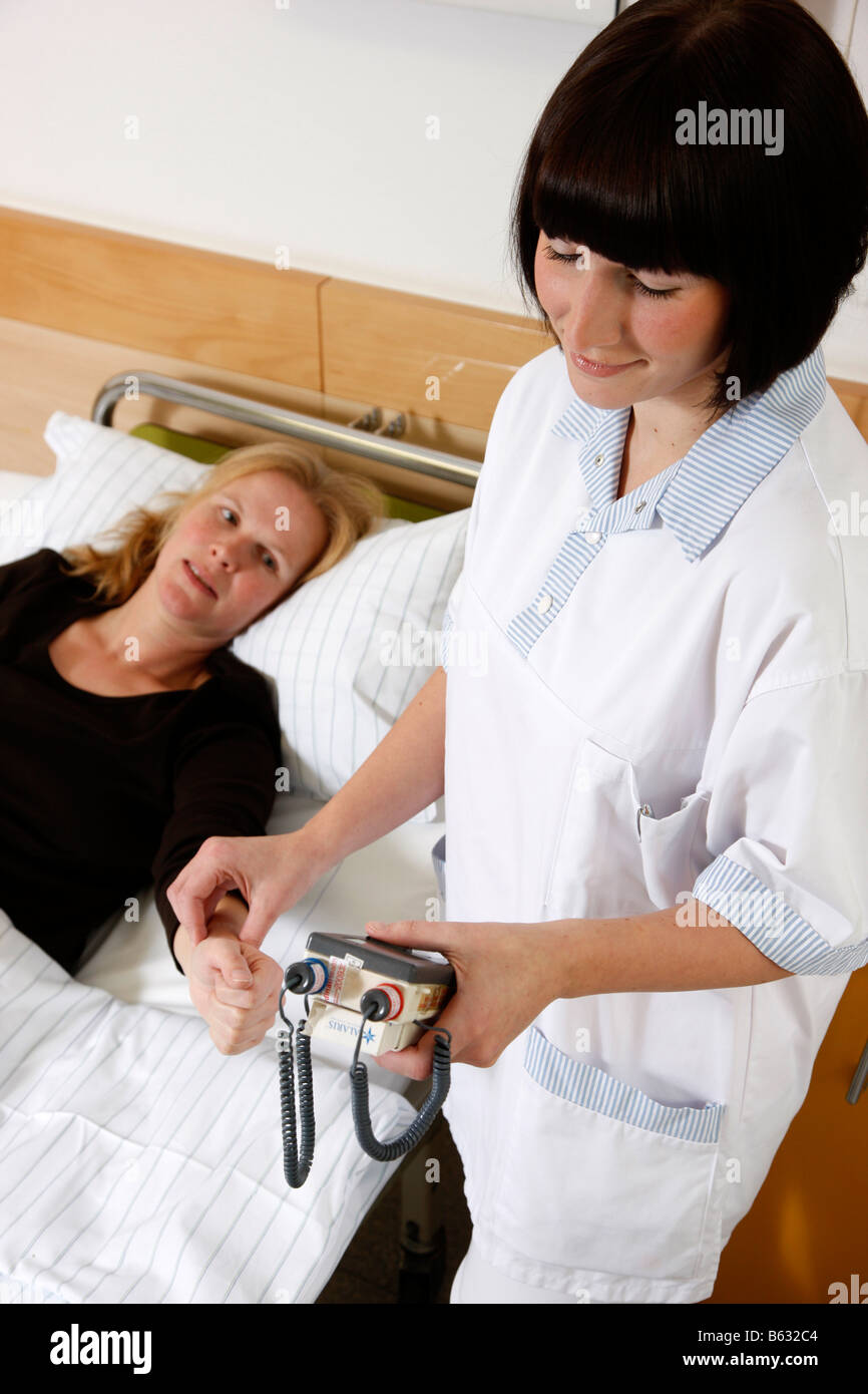Nurse Taking Pulse