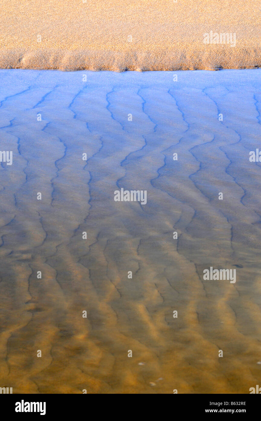 Ripples on the beach Stock Photo - Alamy