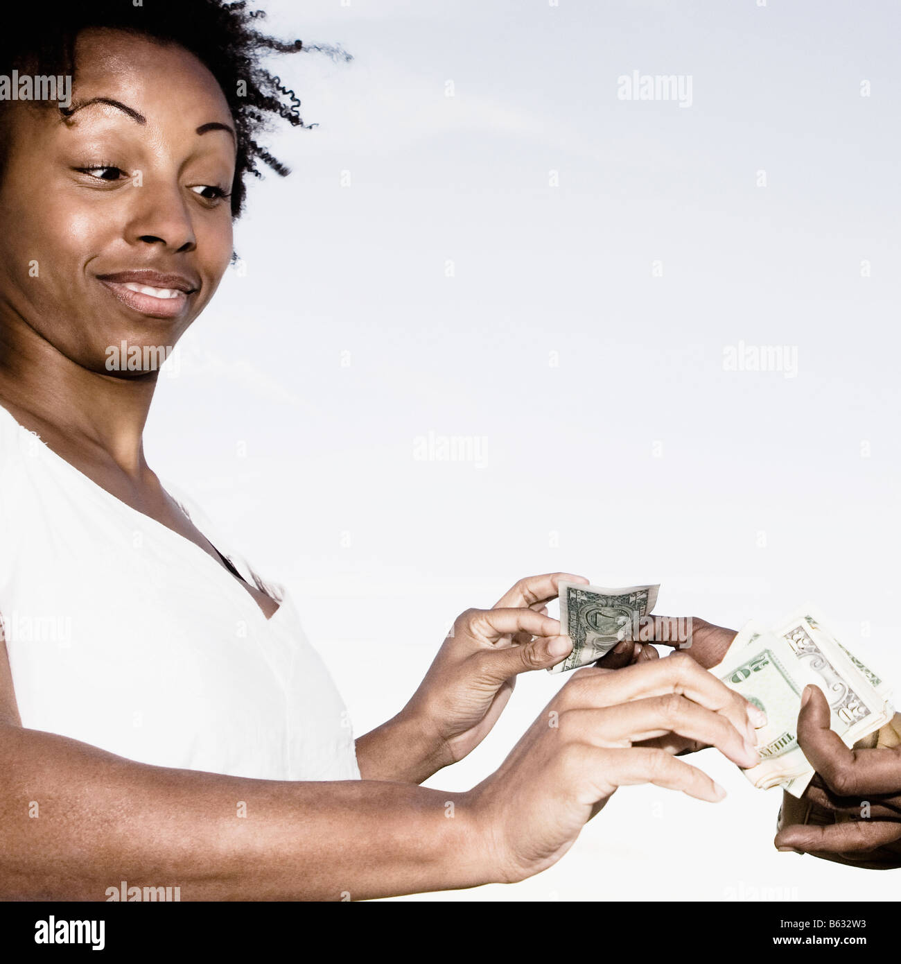 African female hand holding banknote hi-res stock photography and ...