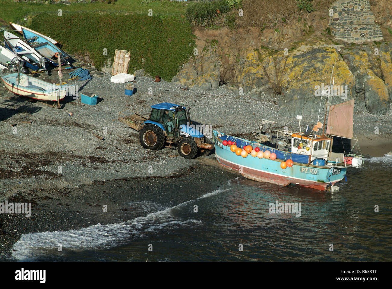 Tractor launching fishing boat hi-res stock photography and images - Alamy
