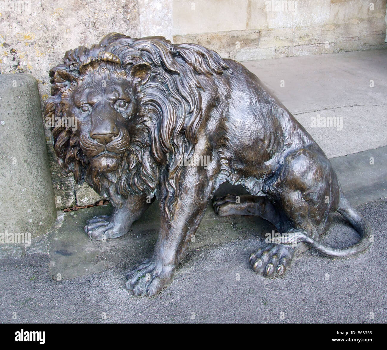 Bronze statue of a lion in a sitting posture from Longleat House and ...