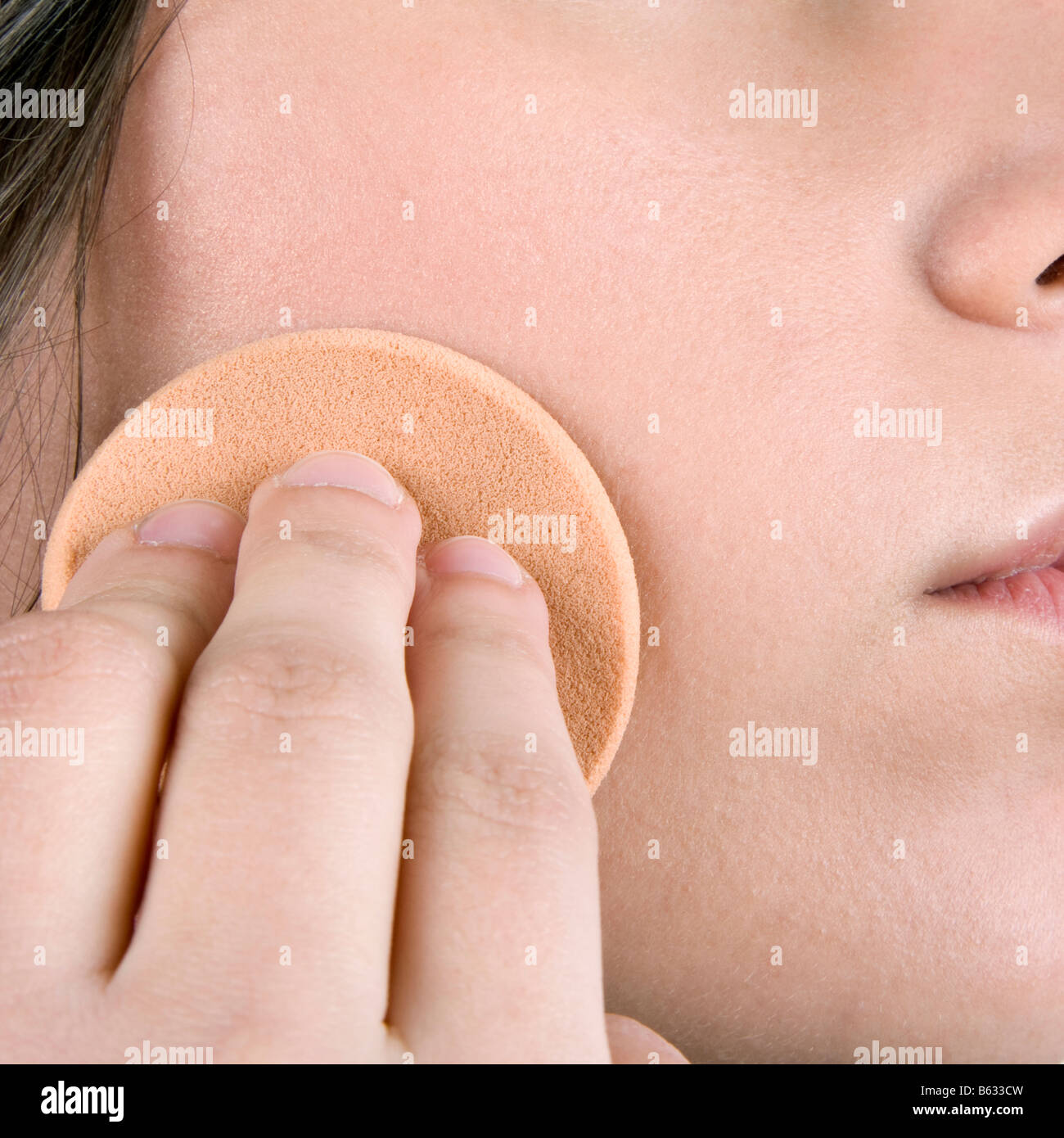 Closeup of woman applying makeup Stock Photo - Alamy