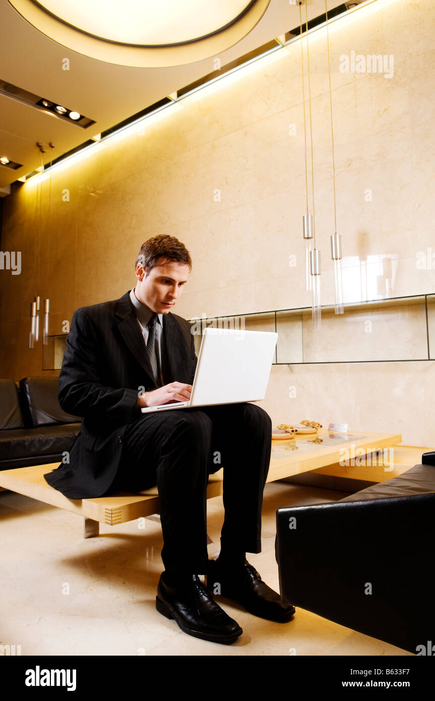 Business executives working on computers hi-res stock photography and ...