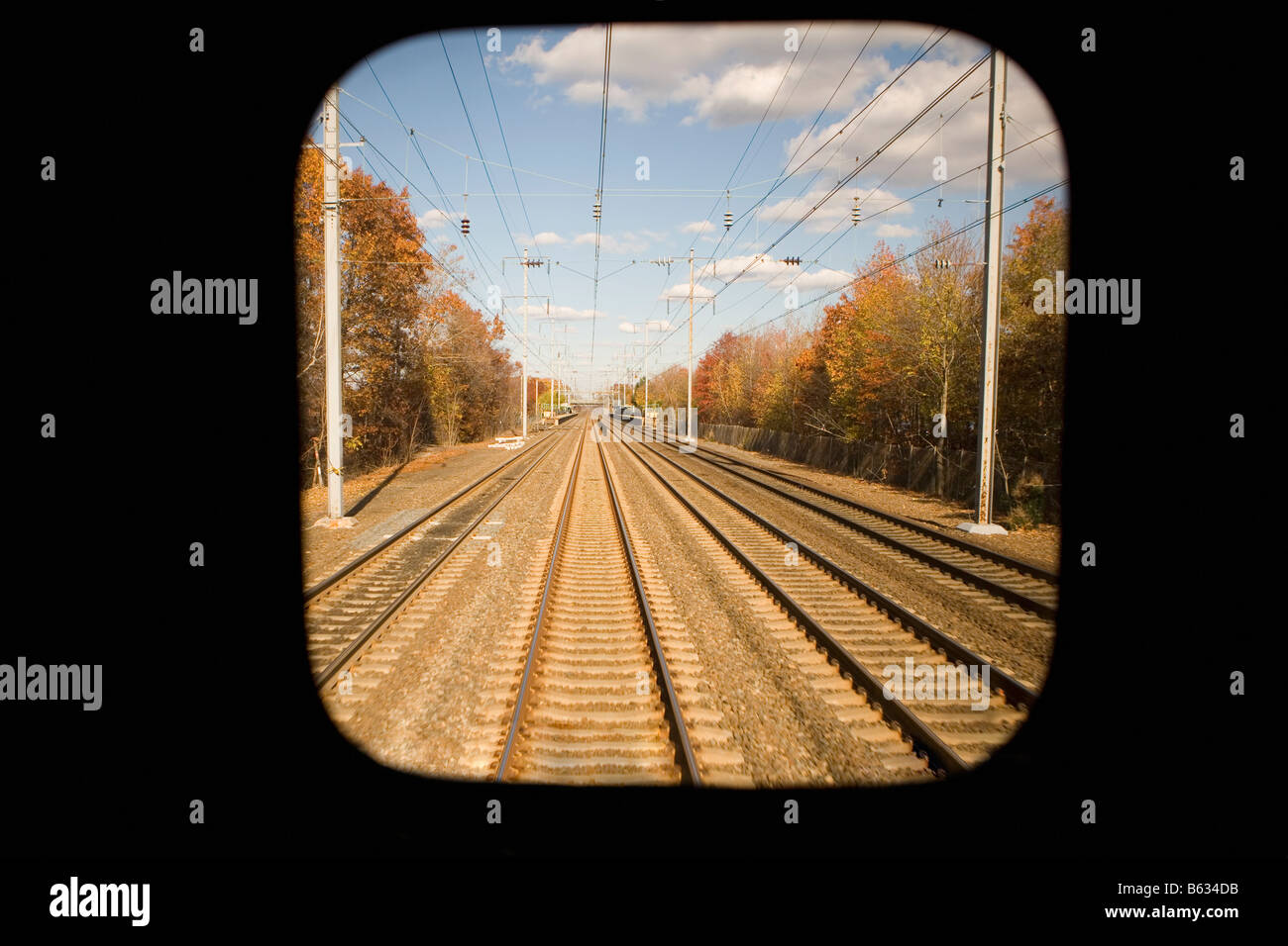 Railroad track viewed through a train window Stock Photo - Alamy