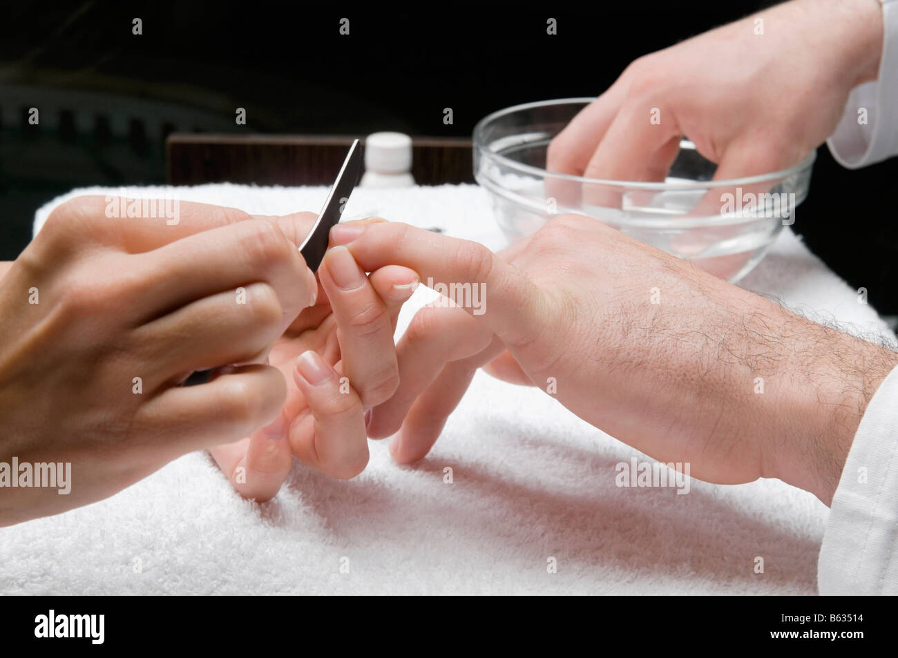 Man getting manicure hi-res stock photography and images - Alamy